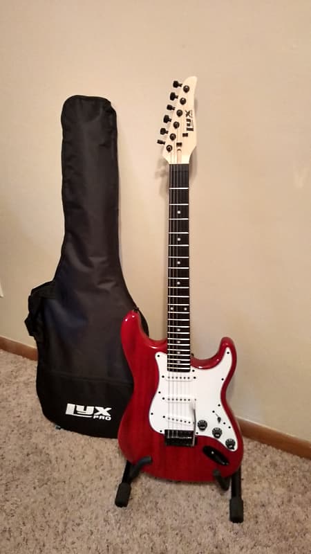 Lyx Pro 39 inch Transparent red stratocaster with gig bag and | Reverb