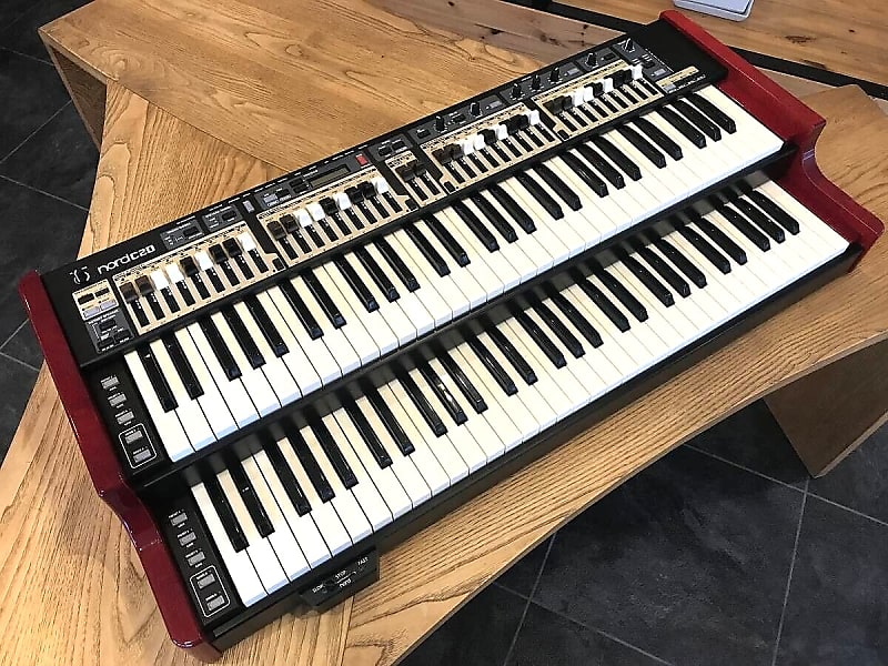 Tested! Rare! Clavia Nord C2D combo organ with half-moon | Reverb