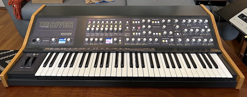 Baloran The River synth (Black w/ Walnut Cheeks) & Flight | Reverb
