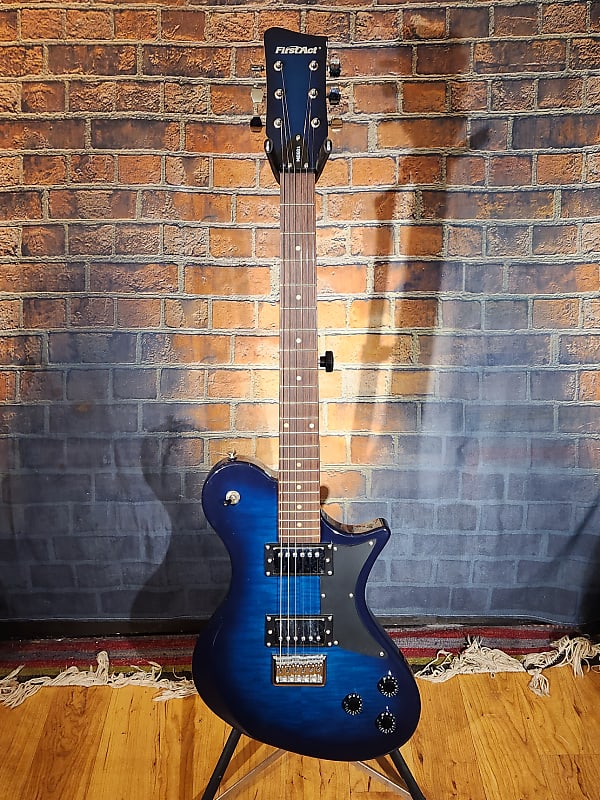 First Act ME601 Trans Blue Rare Offset Body Shape | Reverb