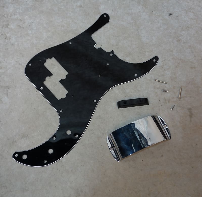 Fender P-bass Precision bass pickguard in black with thumb | Reverb
