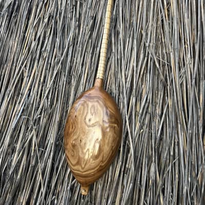 Khomys is a Khakassian two-stringed plucked instrument, a | Reverb