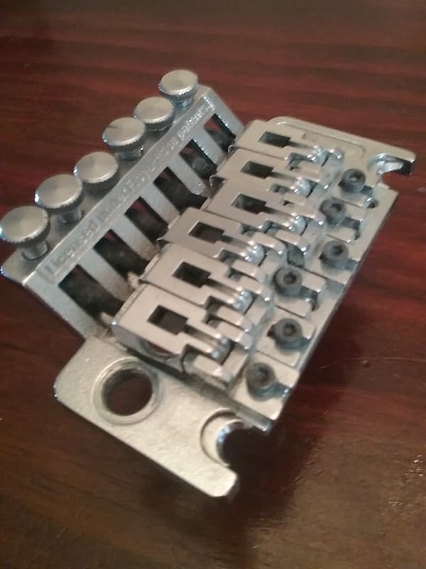 Floyd Rose Licensed tremolo system from a Washburn Mercury | Reverb