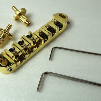 Locking Roller Saddle Bridge Gold/Steel Modern Bushing | Reverb