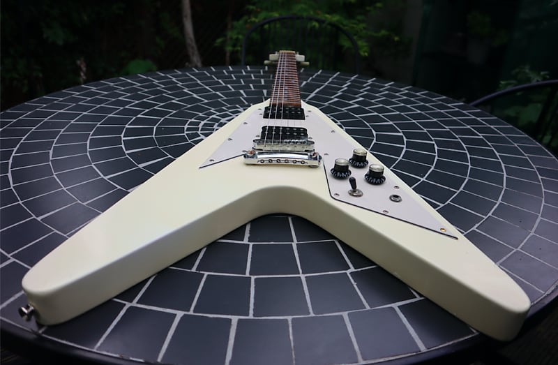 Flying V in vintage white been re-sprayed at some point | Reverb