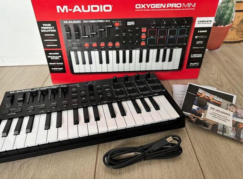 M-Audio Oxygen Pro Mini midi keyboard as new | Reverb Canada
