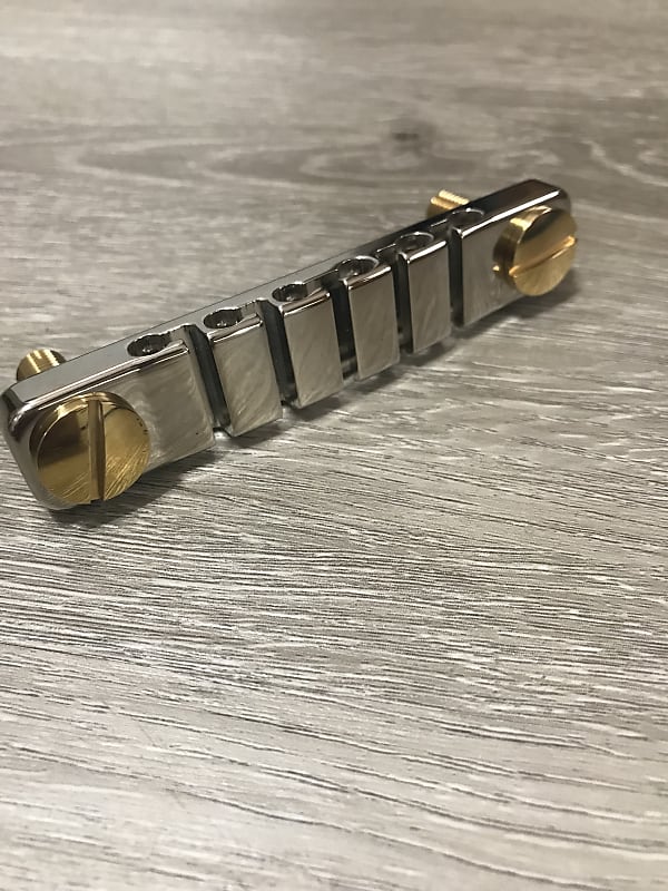 PRS McCarty 2022 Nickel tailpiece w/brass studs | Reverb