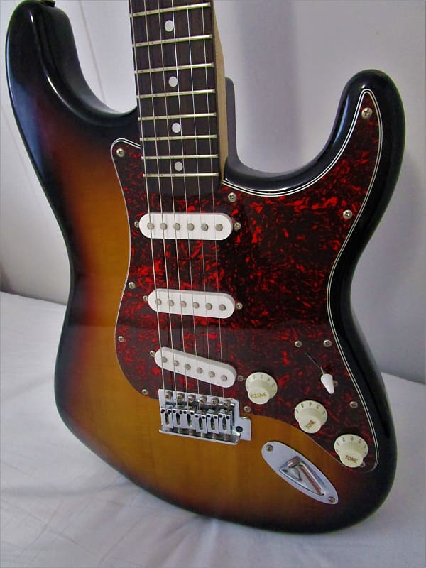 2009 Fender Stratocaster by Squier CXS SSS Red Pearloid on | Reverb