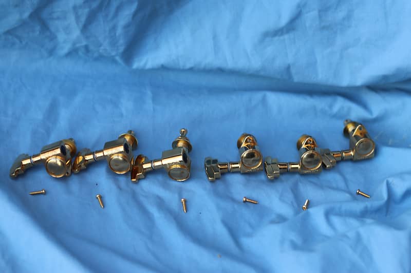 Schaller gold 3/3 tuners with imperial stairstep buttons - | Reverb