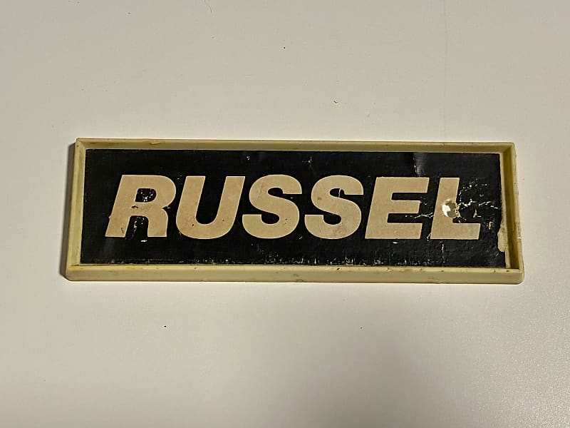 Russel Logo plastic badge | Reverb