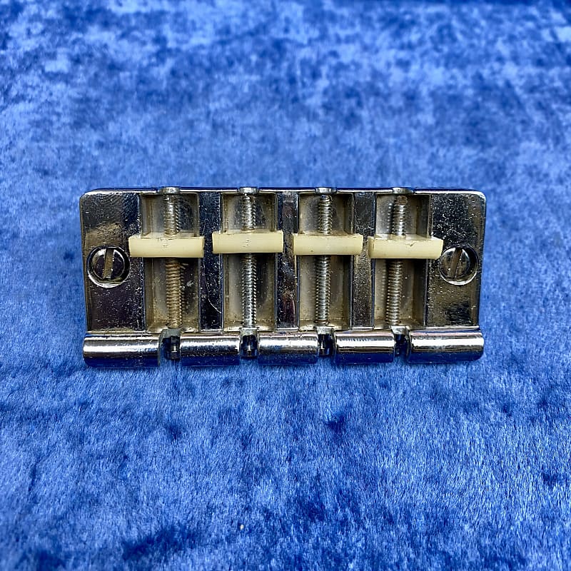 Vintage 1970's Gibson EB Bass Guitar Bridge w/Posts & Nylon | Reverb