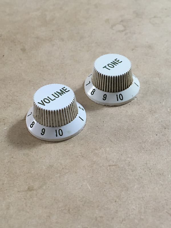 Two Fender Japan E series Strat knobs Rare Fuji Gen 1984 Aged | Reverb