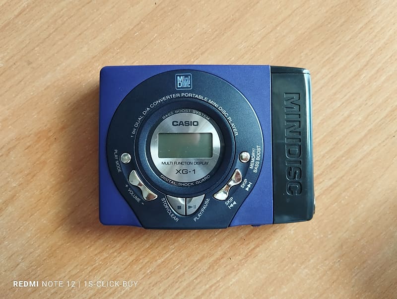 Casio Walkman MD Portable player XG1 1 bit blue working | Reverb UK