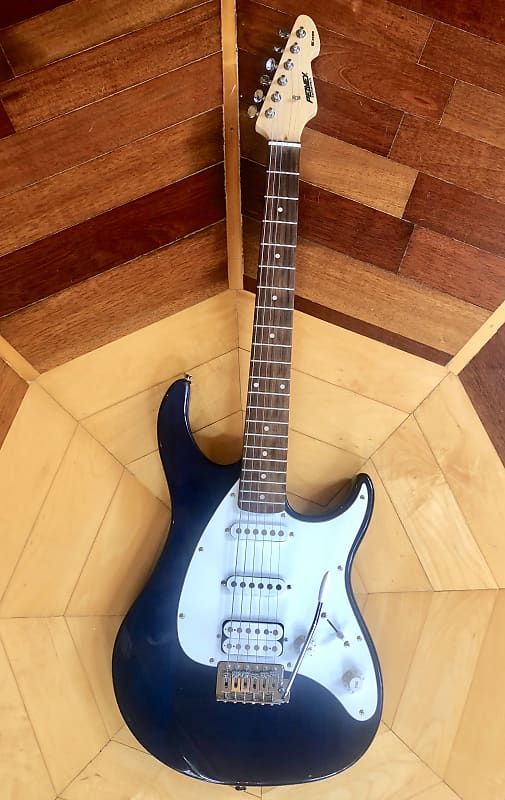 PEAVEY RAPTOR PLUS EXP ELECTRIC GUITAR in TRANSPARENT BLUE | Reverb