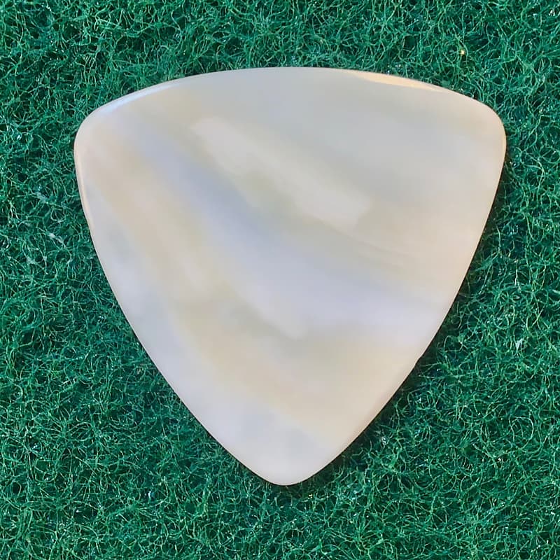 Seashell guitar pick- 1.1mm thick. Curved edge | Reverb Canada