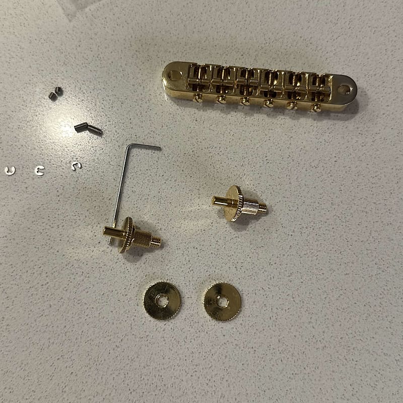 ABM 2400 Roller Tune-o-matic Bridge - Gold | Reverb