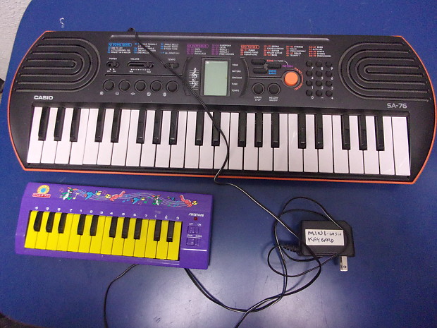 Lot of 2 Casio SA-76 Mini Keyboard black + orange w/ power | Reverb