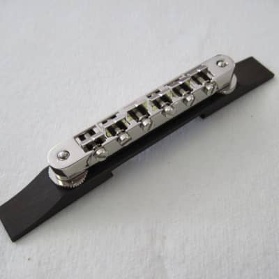 Gretsch Gold Rocking Bar Bridge Assy with Ebony Base | Reverb