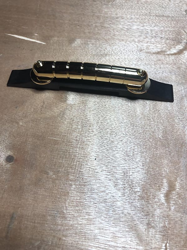 Gretsch Bridge Assembly "Rocking" Bar Gold with Ebony base | Reverb