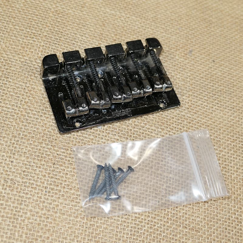 Bridge Cosmo Black, Genuine 2008 Ibanez Accu-cast B105 fixed | Reverb