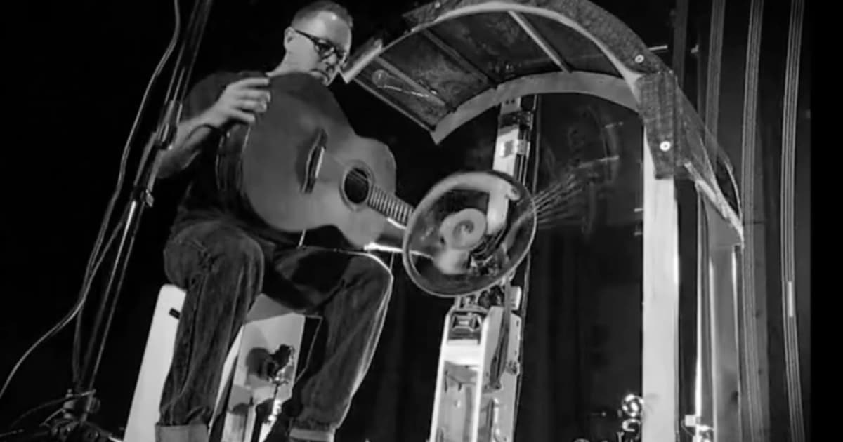 Ever Seen Someone Play Guitar with a Spinning Wheel? | Reverb News