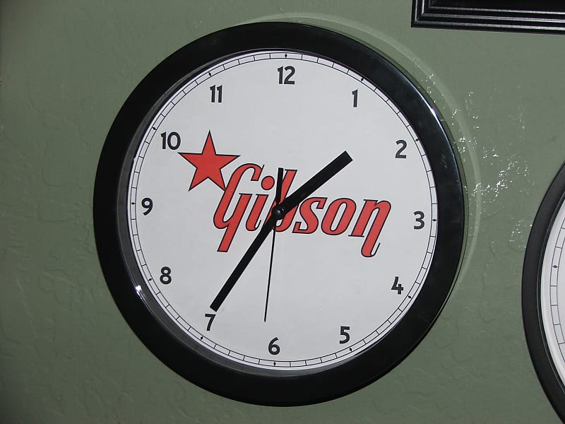 Gibson Studio wall.clock ..9" diameter..(1) 12"x8" sign (1) | Reverb
