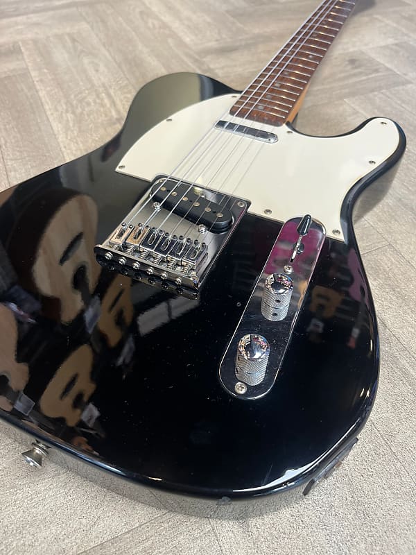 Squier Telecaster with black body and rosewood neck | Reverb UK