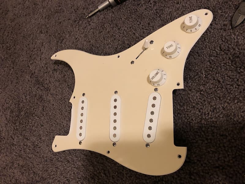 Squier Loaded Strat pickguard 1 ply aged white with white | Reverb