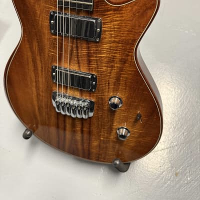 Taylor acoustic guitars, bass guitars, electric guitars, pickguards ...