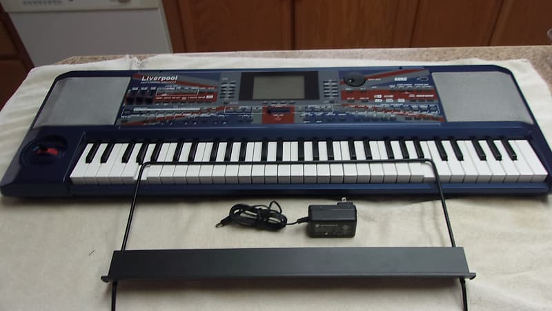 Mint Korg Liverpool Keyboard w/ p.supply & 30 Beatles | Reverb