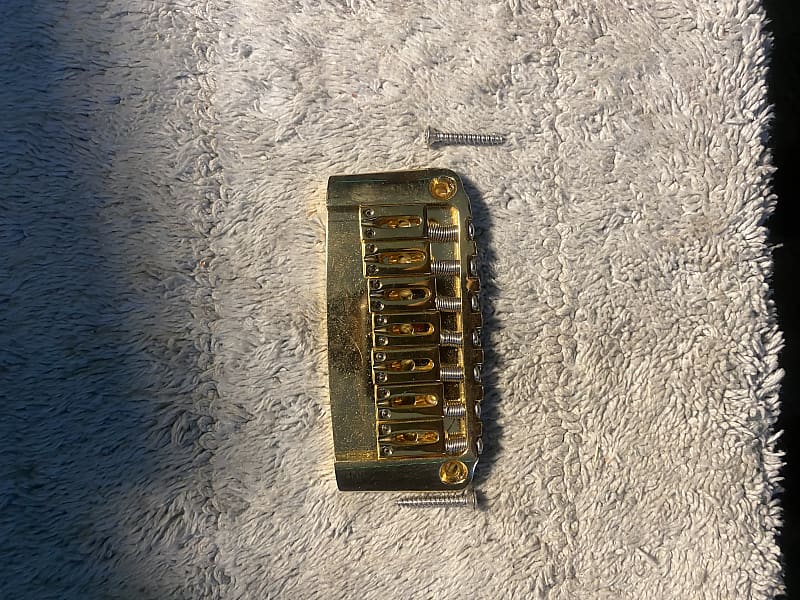 Hipshot ibanez 7 Gibraltar string bridge - Gold | Reverb