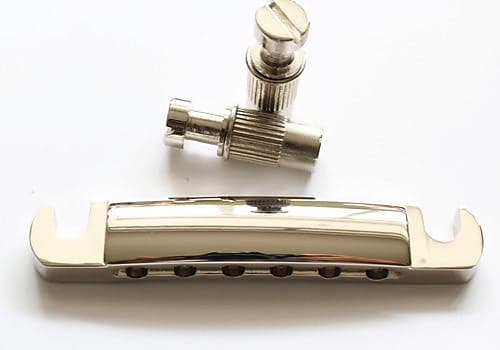 Nickel Tune-O-Matic Tailpiece for Les Paul guitar,Curved | Reverb