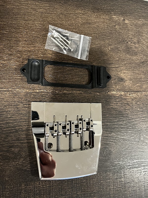 Hipshot 5RK400AC Rickenbacker Bridge/Treble Bezel | Reverb