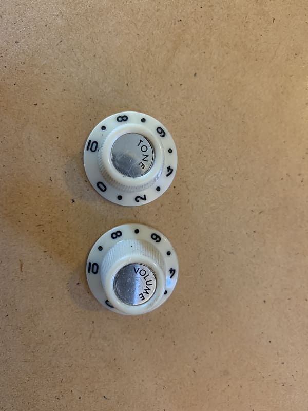Pair of Teisco guitar knobs | Reverb