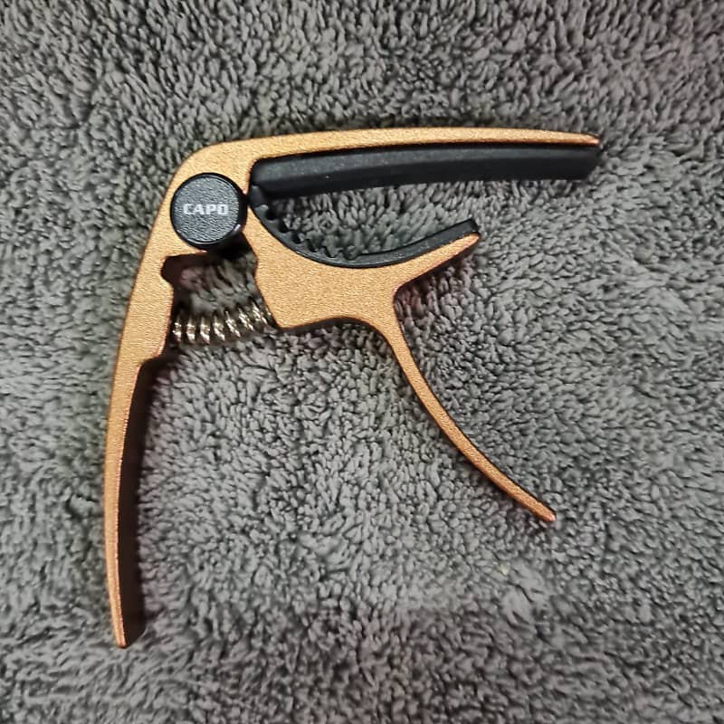 Capo Co Guitar Capo Bronze | Reverb