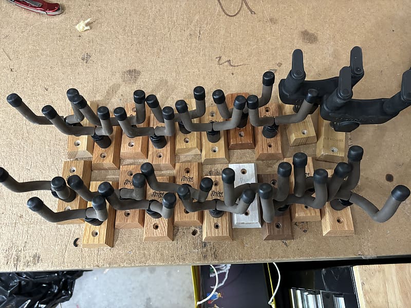Lot of 21 Swing String & Hercules Wooden guitar hangers | Reverb
