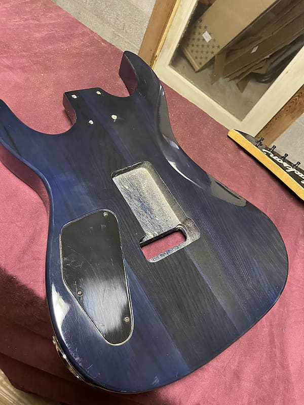 Translucent Blue Body + Reverse Headstock Jackson Neck | Reverb
