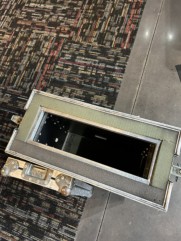 Used 3 space road case floating w/ wheels | Reverb