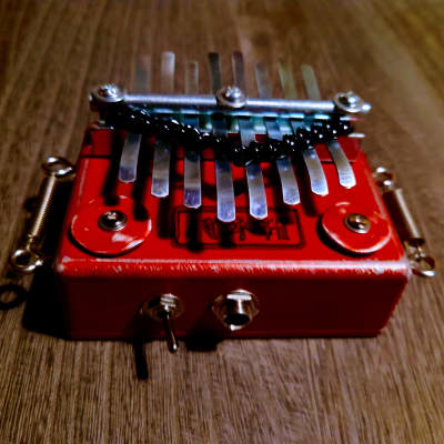 kalimba/noise box/percussion/noise instrument/metal | Reverb