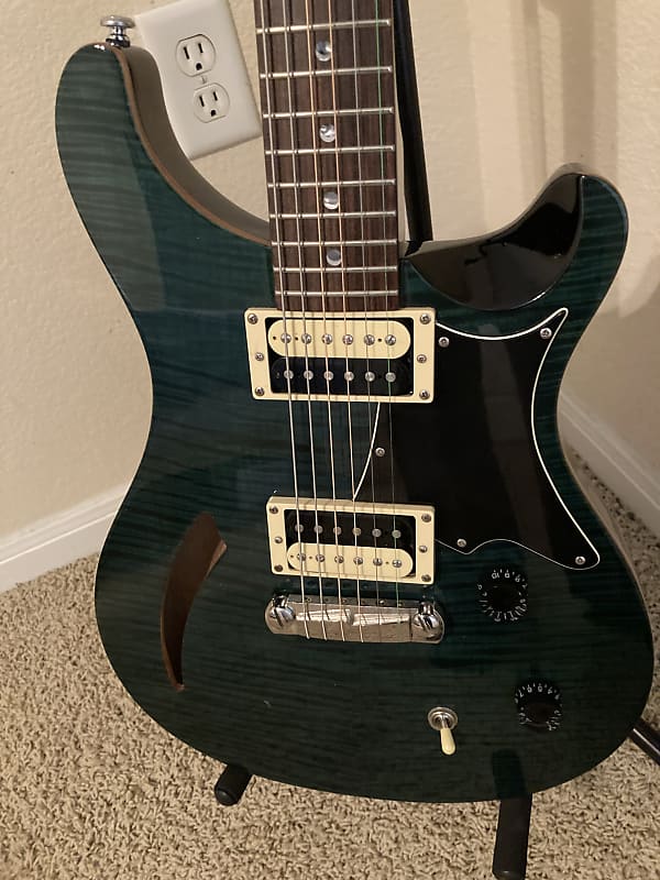 PRS SE 22 Custom. Semi -hollow body flame top. Translucent | Reverb