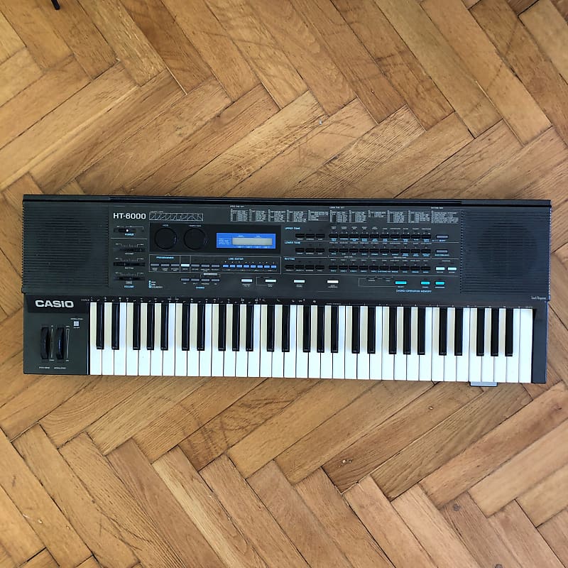 Casio HT-6000 1987 black + Hohner ROM card | Reverb