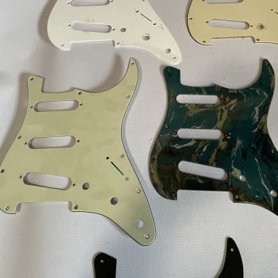Huge lot of Fender Stratocaster Pickguards & 1 Tremolo Cavity | Reverb