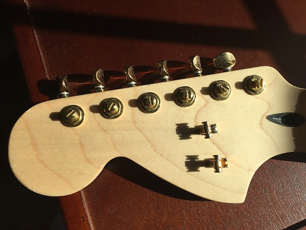 Gotoh locking tuners and roller string trees-Gold | Reverb