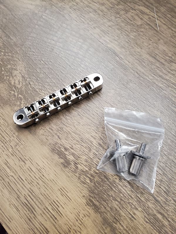 ABM 2400n Roller Bridge - Nickel with mounts | Reverb
