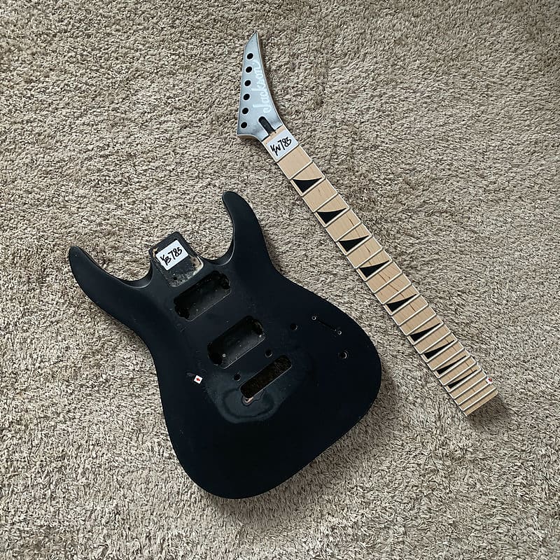 Jackson Guitar Maple Wood Neck with Black Body DIY | Reverb