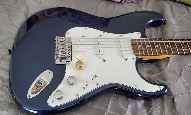 Partscaster strat with a tele neck 2000's transparent blue | Reverb