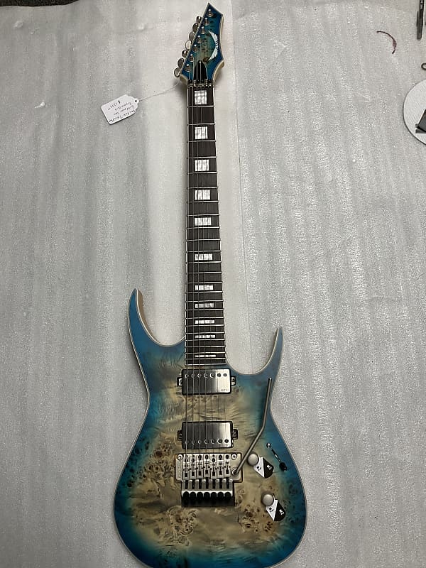 Dean Exile 7-string Satin turquoise burst used | Reverb