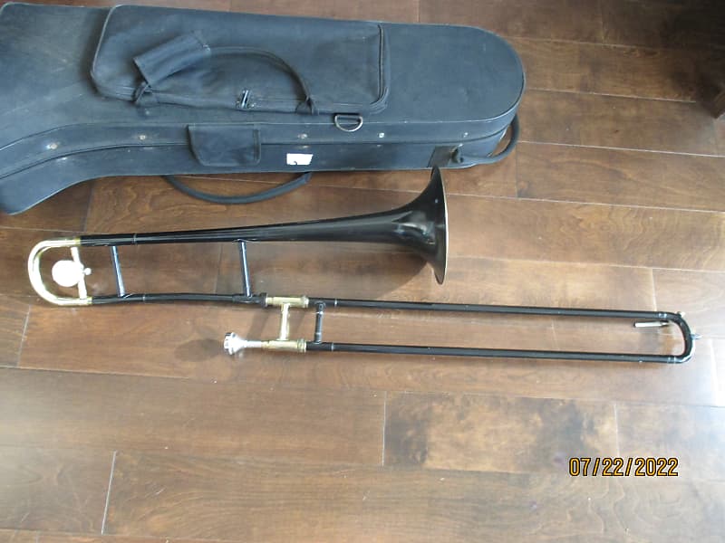 Trombone, Black & Gold. With case and mouthpiece | Reverb