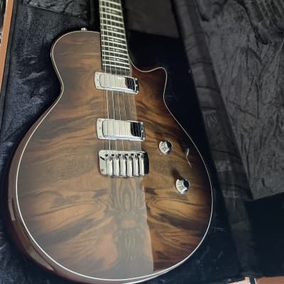 Taylor acoustic guitars, bass guitars, electric guitars, pickguards ...