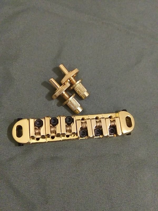 Wilkinson Tune-O-Matic Locking Roller Bridge - Gold | Reverb